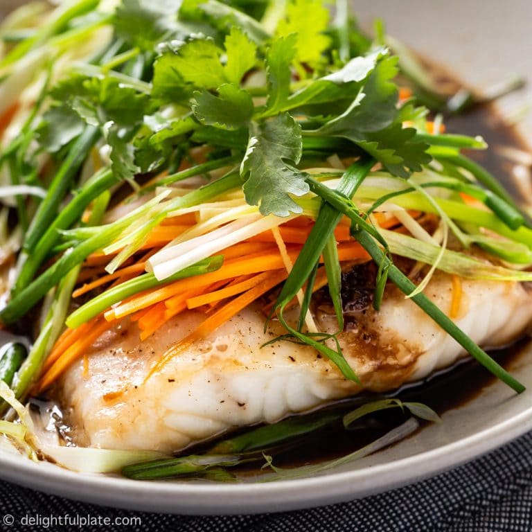 Steamed Fish with Ginger and Soy Sauce - Delightful Plate