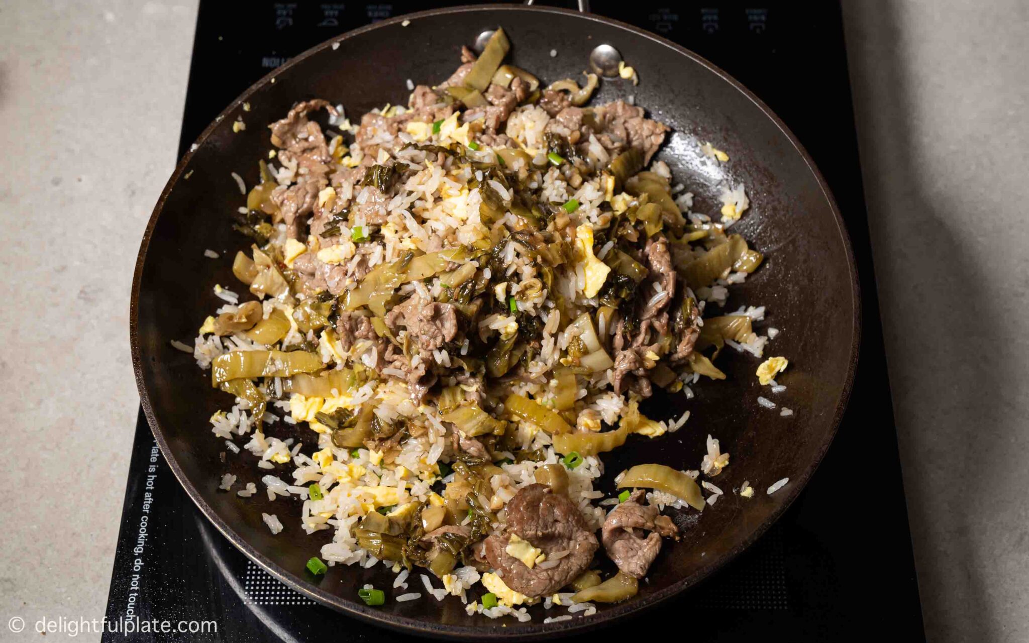 Vietnamese Beef Fried Rice with Pickled Mustard Greens - Delightful Plate