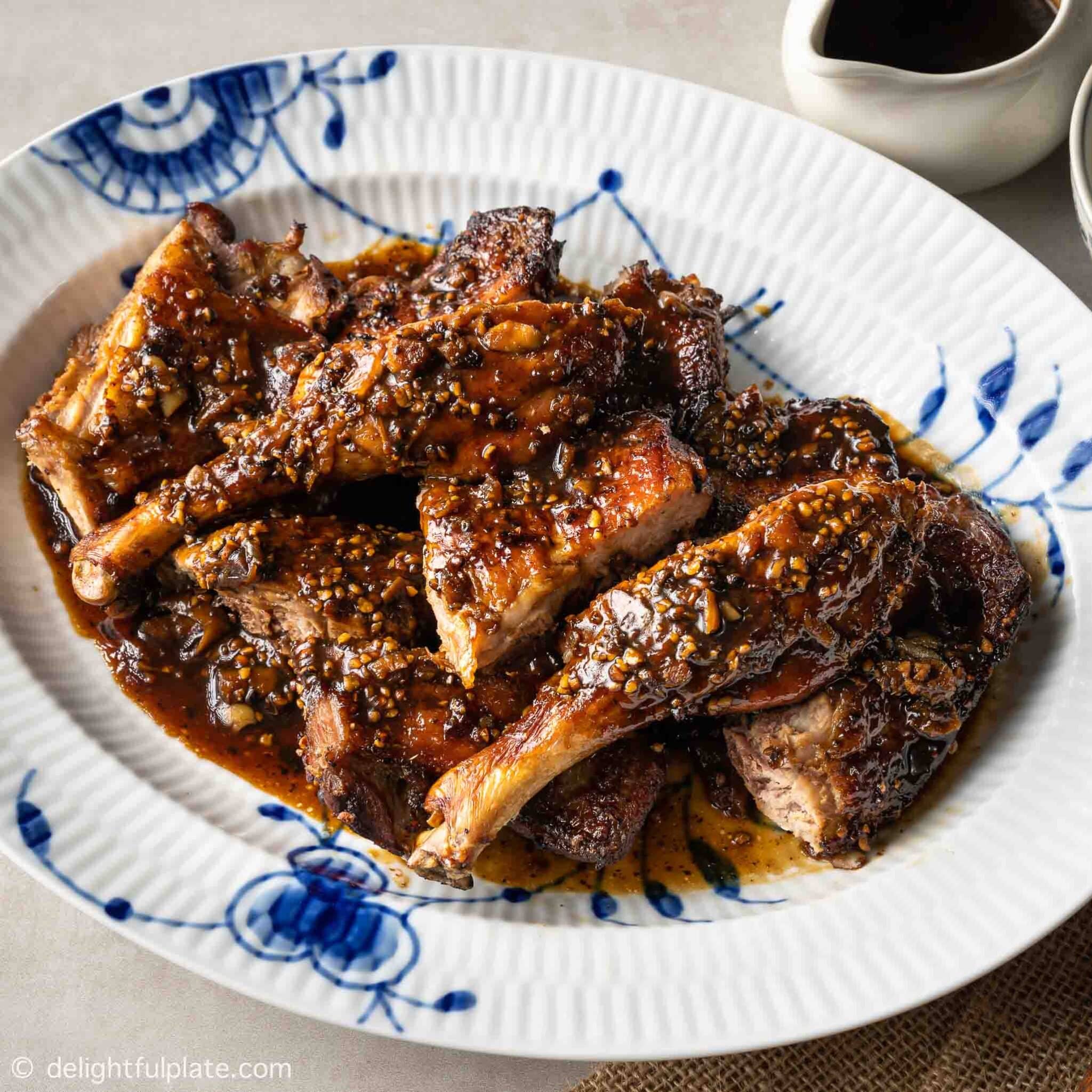 Roasted Duck Legs with Black Pepper Sauce - Delightful Plate