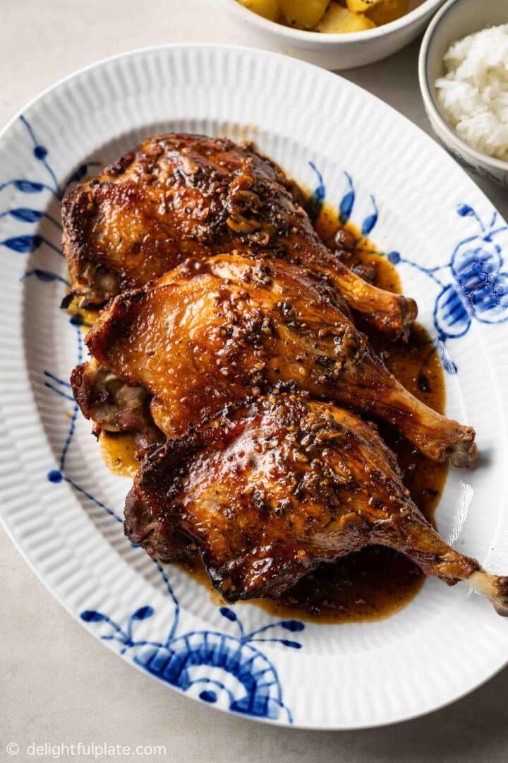Roasted Duck Legs with Black Pepper Sauce - Delightful Plate