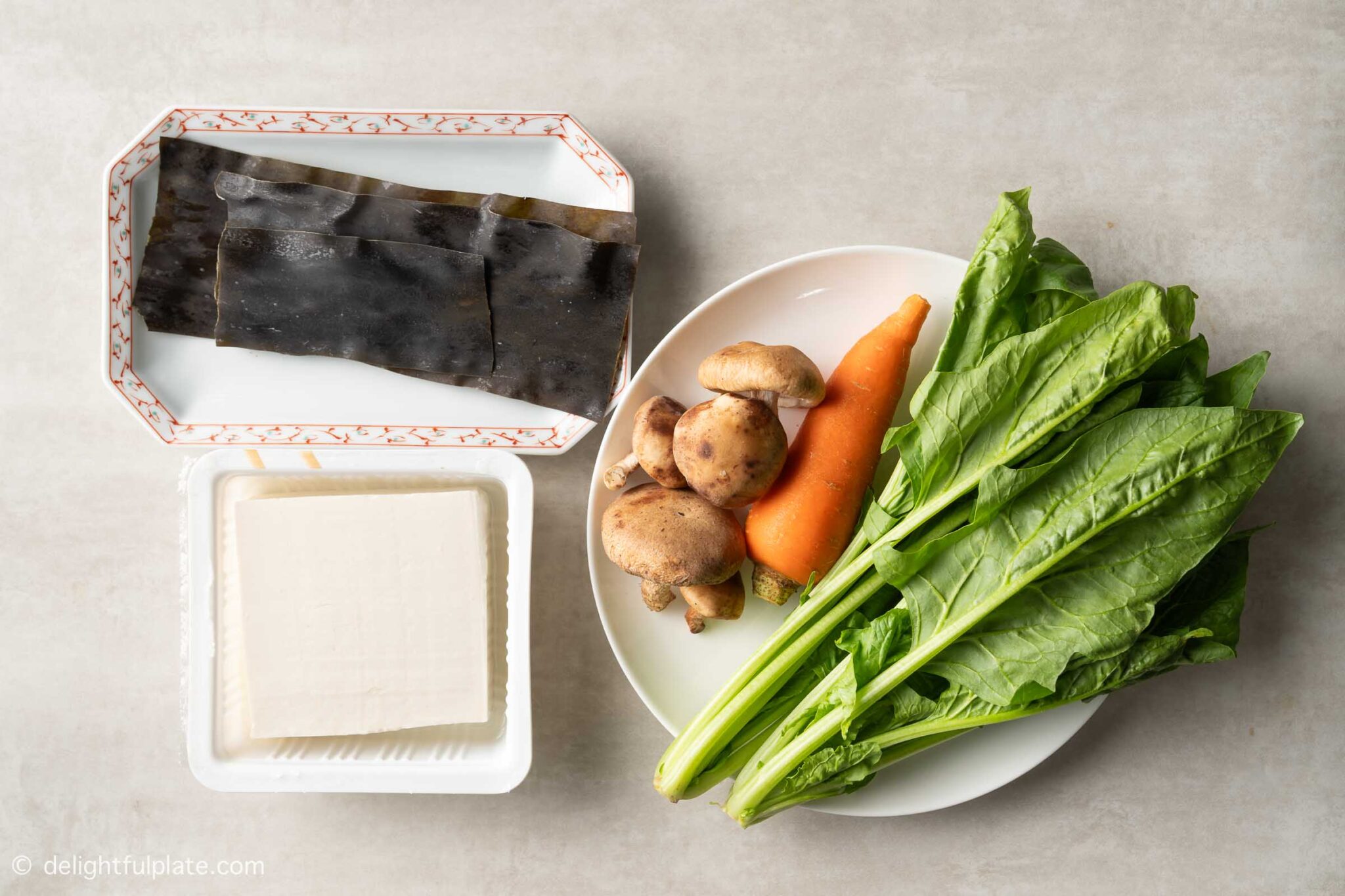 Suimono Clear Soup with Tofu and Vegetables - Delightful Plate