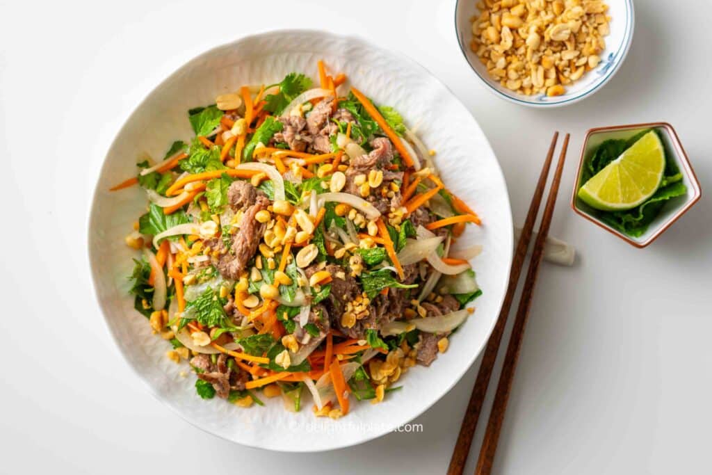 Vietnamese Rare Beef in Lime Juice Salad (Bò Tái Chanh) - Delightful Plate